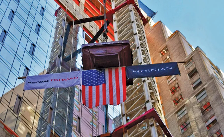 The team erected the tower of 460 feet in the place of Manhattan tight ...